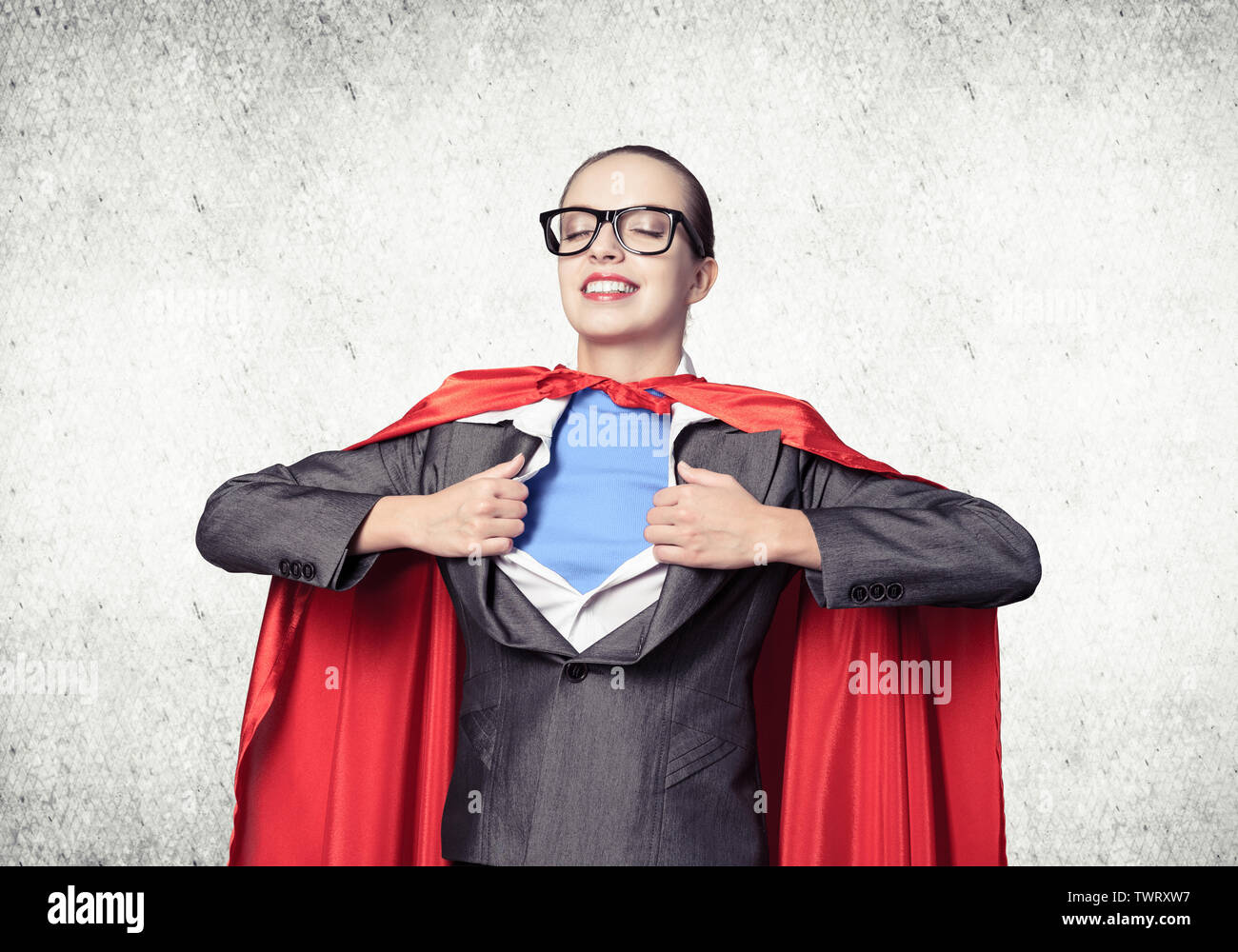 Portrait of business woman super heroine tearing off her shirt. Smiling ...