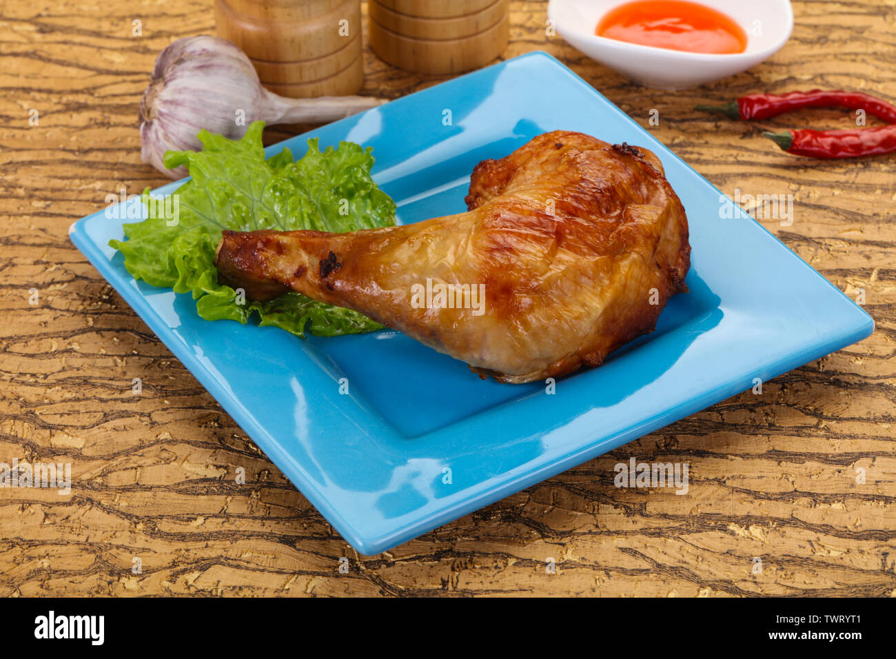 Crispy tasty Roasted chicken leg Stock Photo - Alamy