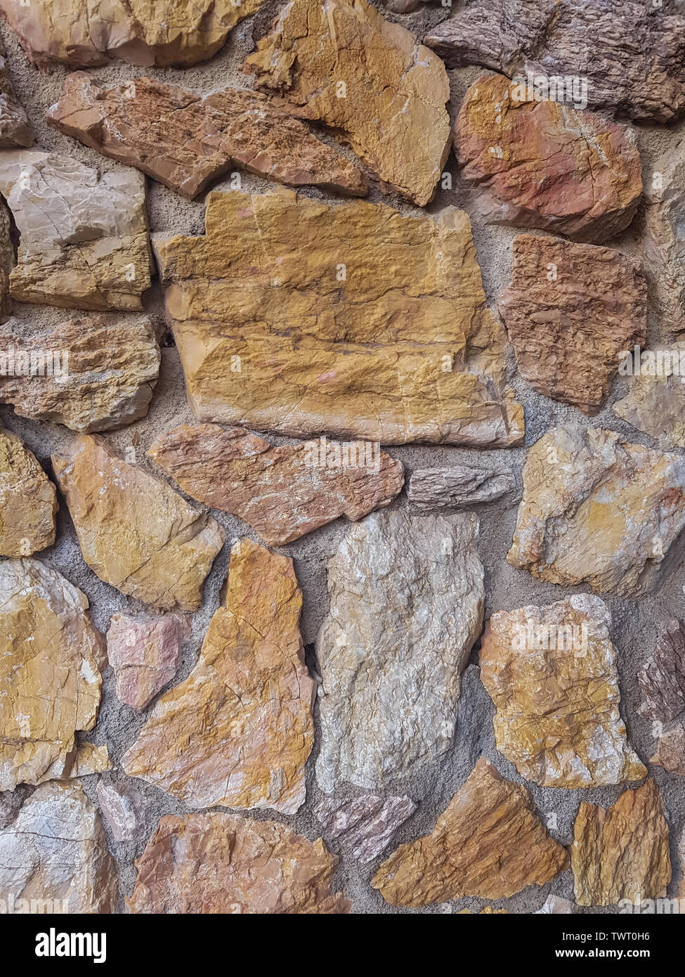 Stone masonry with various rough stones Stock Photo - Alamy