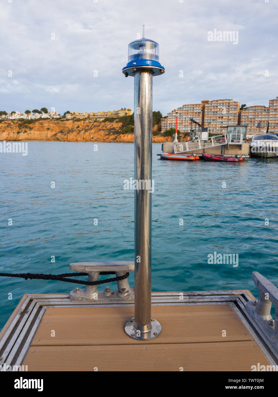 Column lighting of the piers in the Marina Stock Photo - Alamy