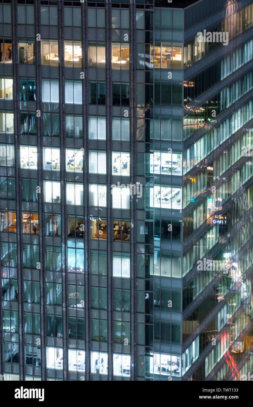 Modern building skyscraper glass window with illuminated Stock Photo ...