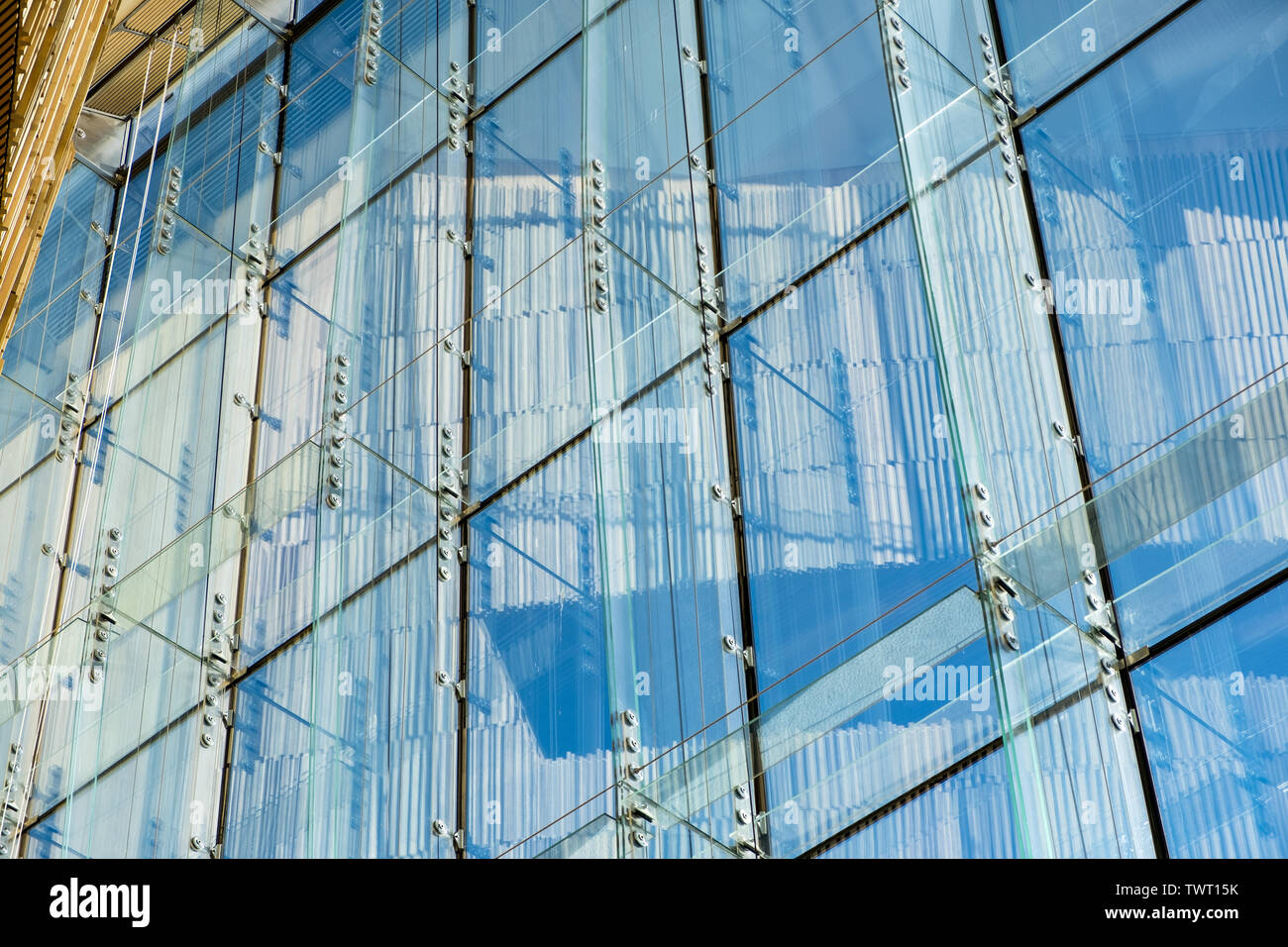 Constructor of blue transparent glass windows with reflective glowing ...