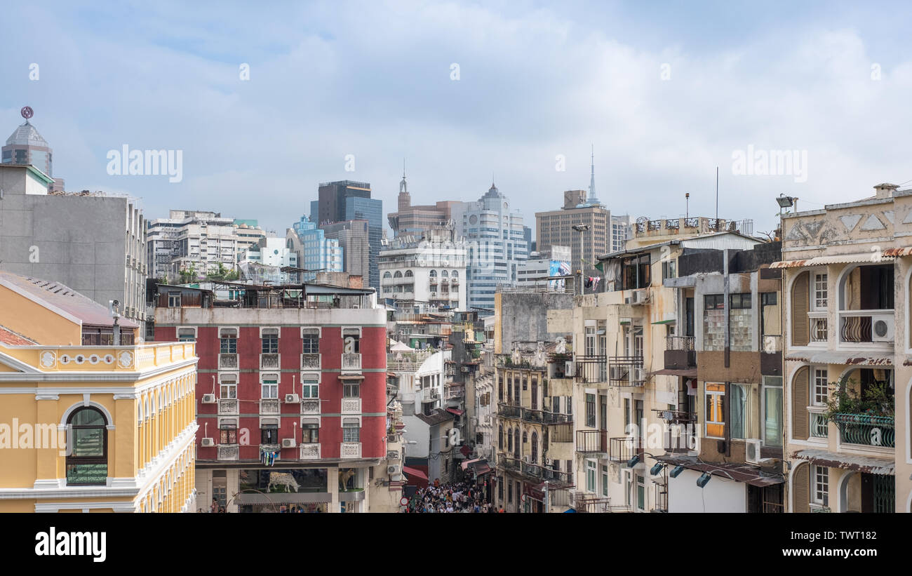 Ancient buildings crowded in attractions town with skyscraper in ...