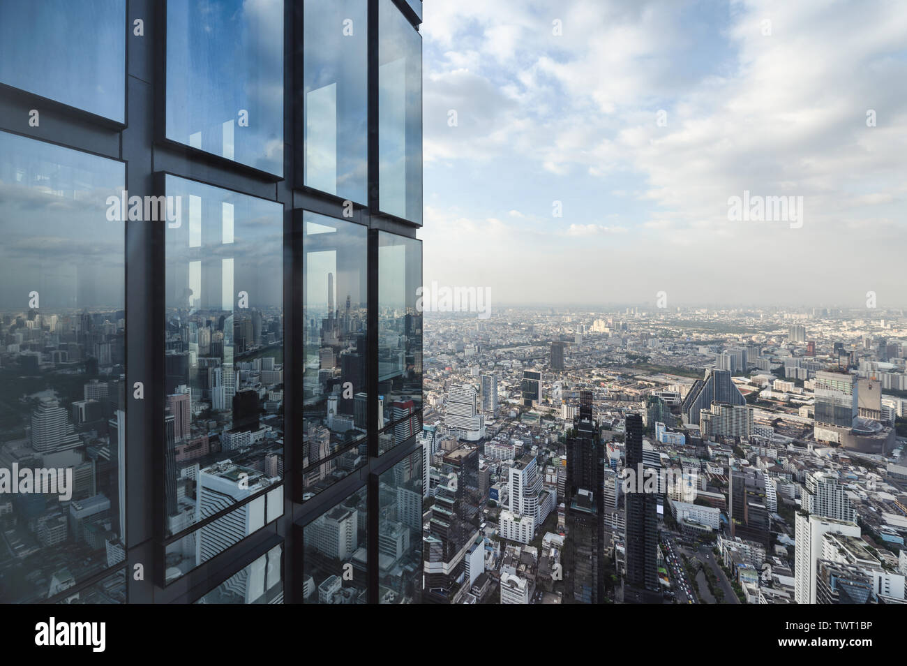 Modern glass building with crowded building in bangkok city Stock Photo ...
