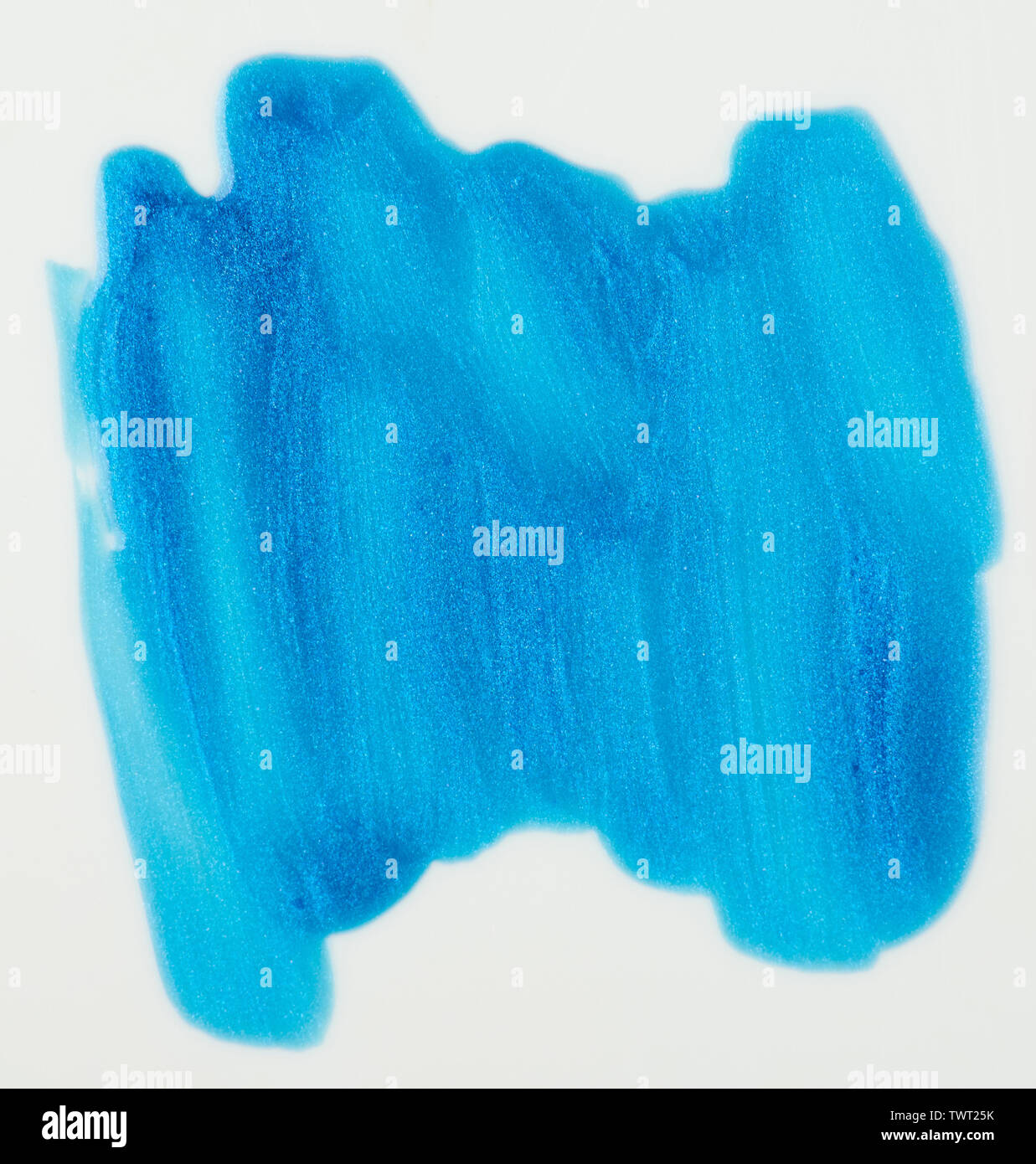 Sparkle blue paint stain isolated on white background close up view ...