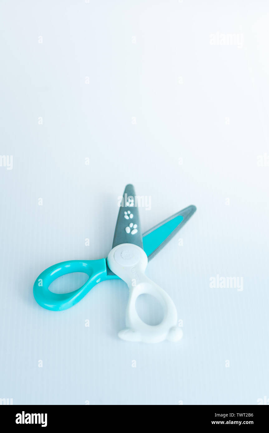 children's colourful safe scissors on a white background. scissors made ...