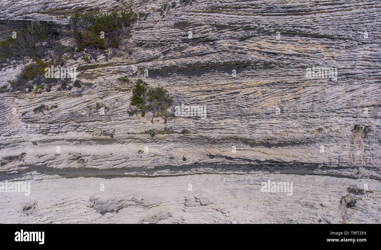 The surface of a steep limestone cliff Stock Photo - Alamy