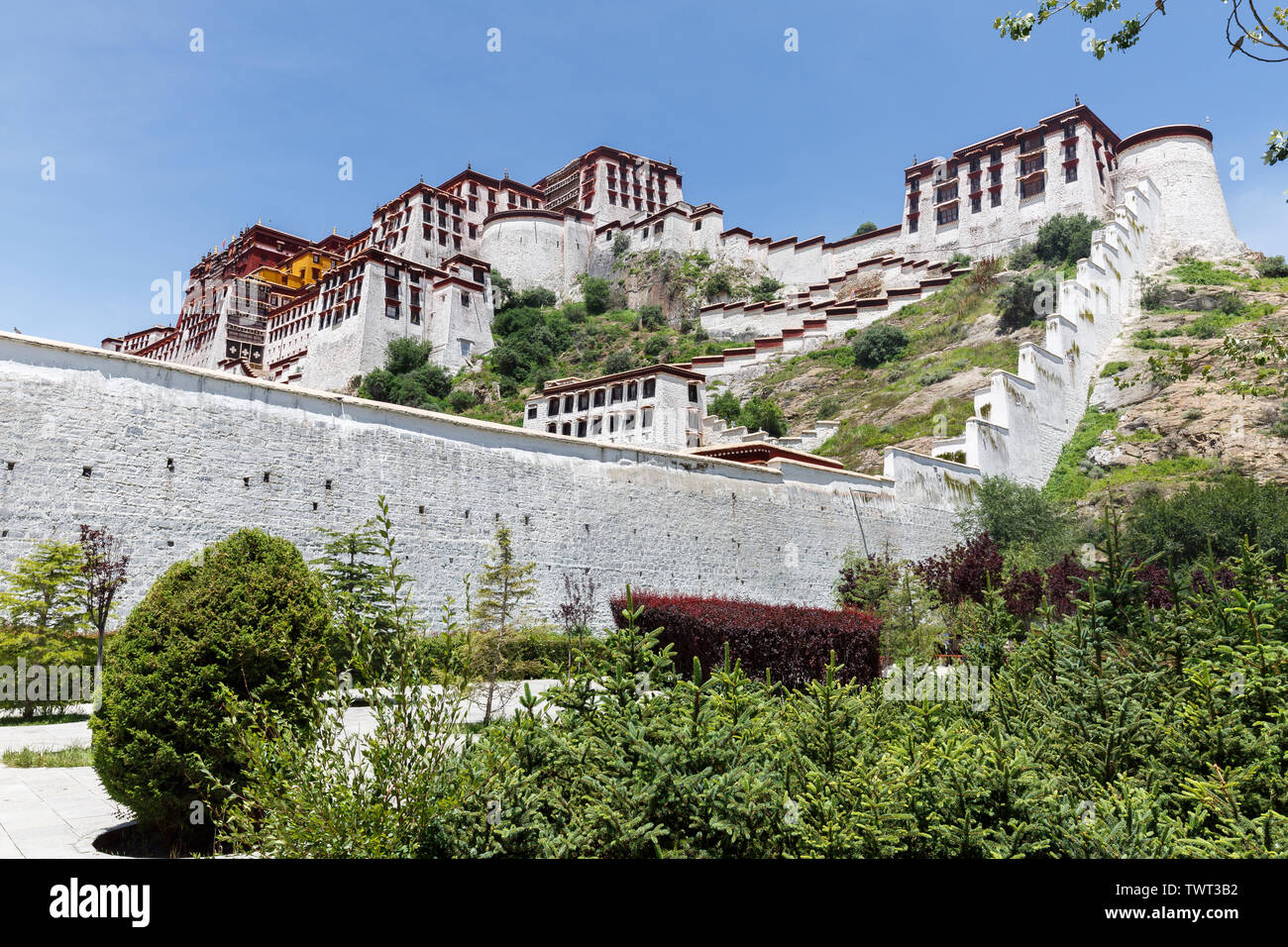 Side view of Potala Palace with wall in the foreground. Home of Dalai ...