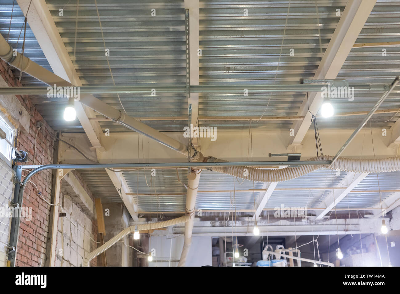 indoors and workshop concept - ceiling of the workshop at the factory ...