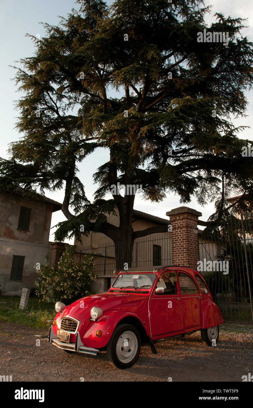 Red Citroën 2CV photographed in rural environment (Milan, Italy Stock ...