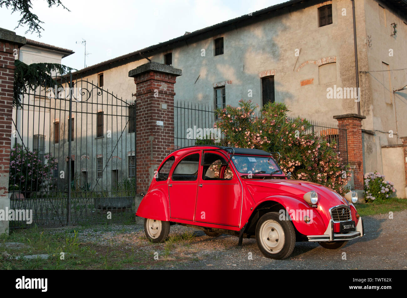 Red Citroën 2CV photographed in rural environment (Milan, Italy Stock ...
