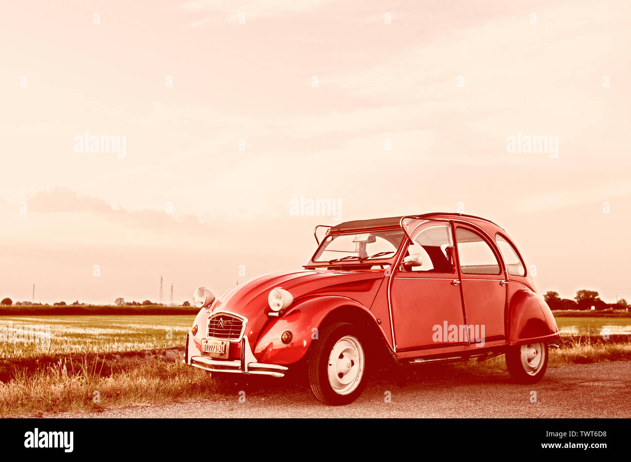 Red Citroën 2CV photographed in rural environment (Milan, Italy Stock ...