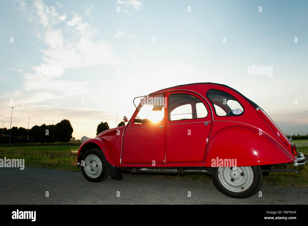 Red Citroën 2CV photographed in rural environment (Milan, Italy Stock ...