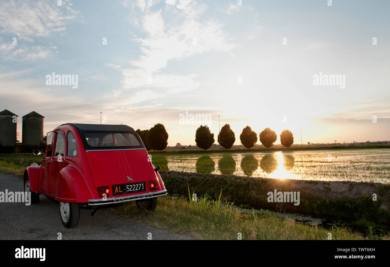 Red Citroën 2CV photographed in rural environment (Milan, Italy Stock ...