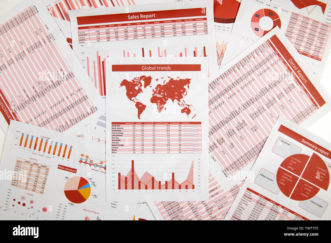 Business reports, data tables and charts - directly above view of ...