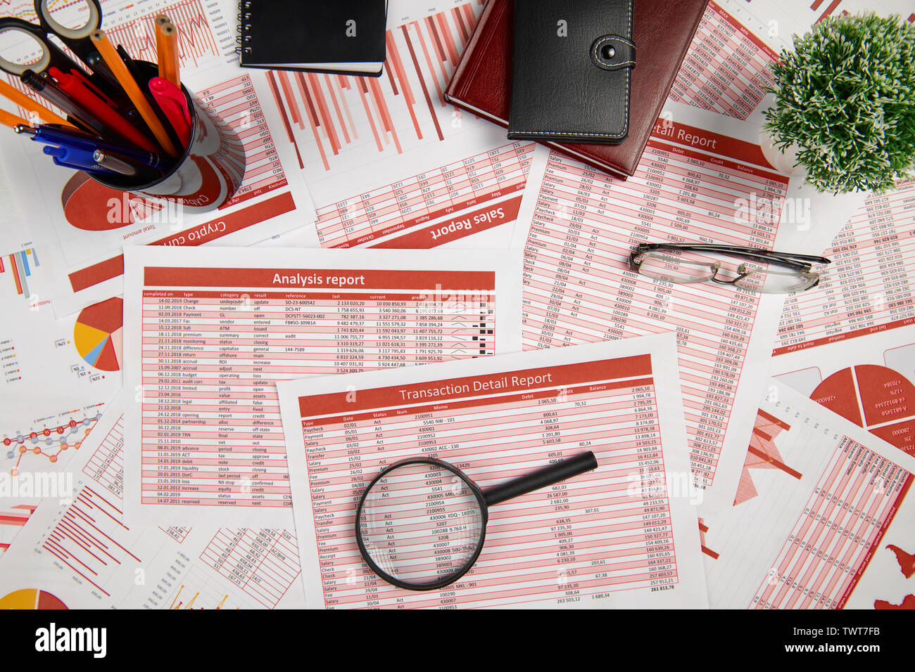 Business reports, data tables and charts - directly above view of ...