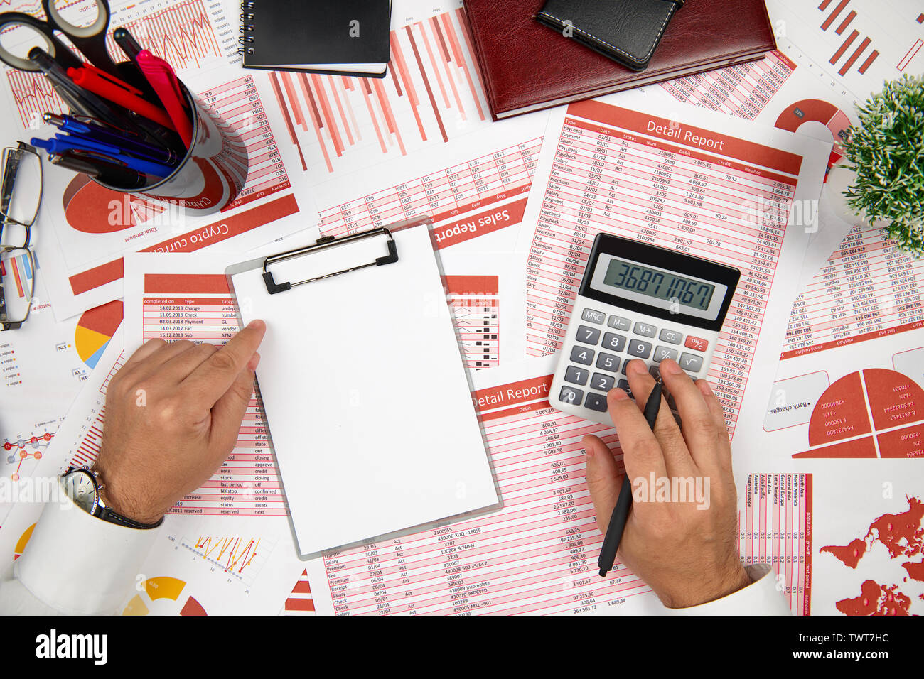 Business reports, blank paper sheet, data tables and charts - directly ...