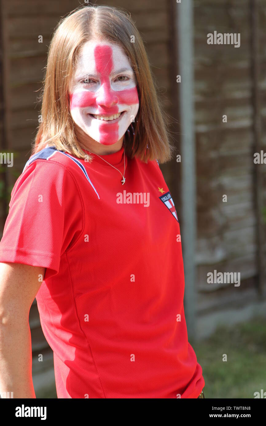 England, UK - MR Young female football fan with a St. George's England ...