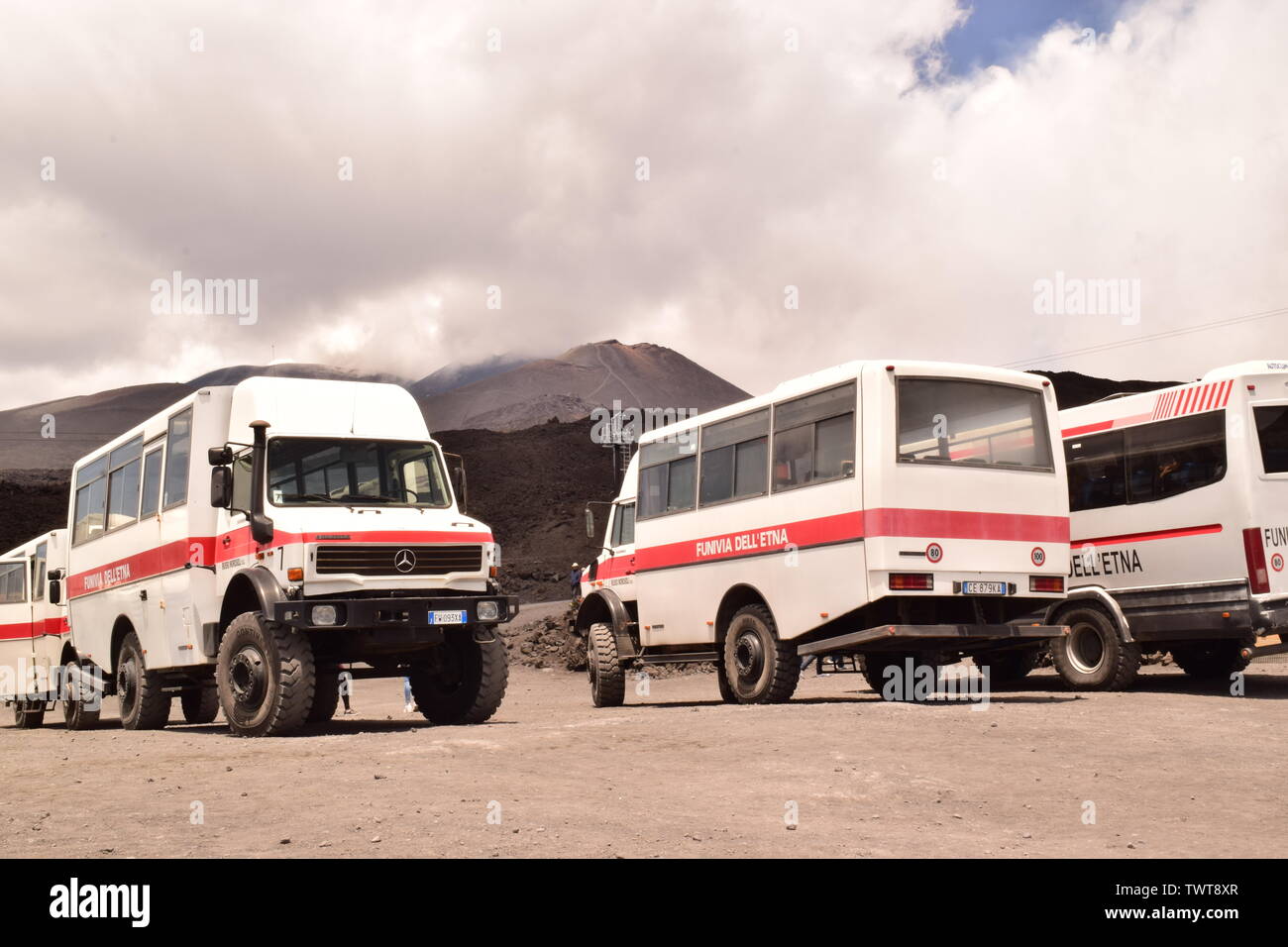 Sicily. Buses travel to the top of Etna Vulcano Stock Photo - Alamy