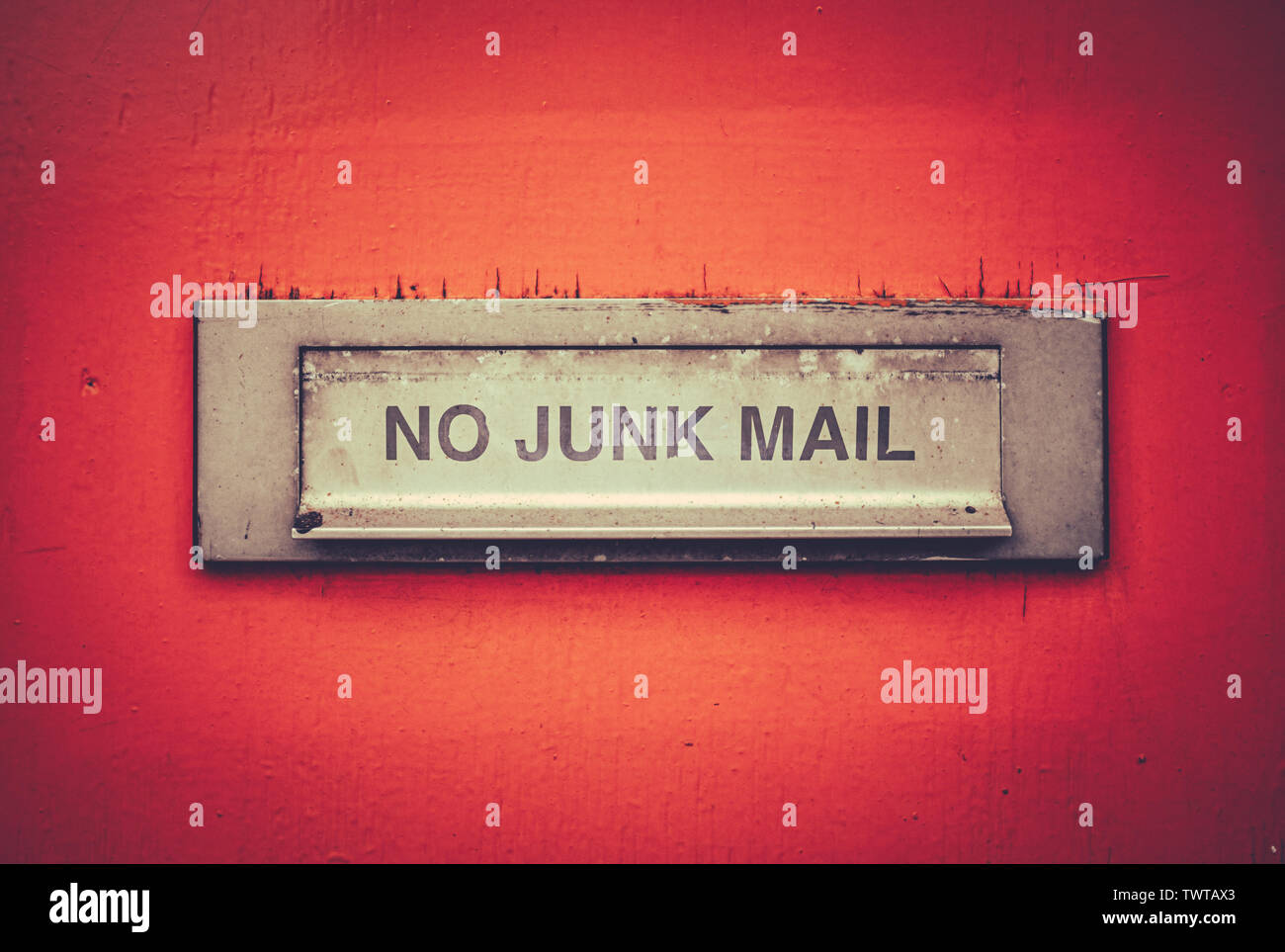 A Letterbox On A Grungy Orange Door With A No Junk Mail Sign Stock ...