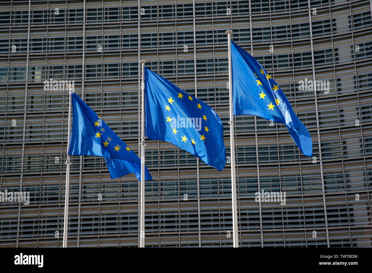 Brussels, Belgium – June 21, 2019: EU flags swing in the air in front ...