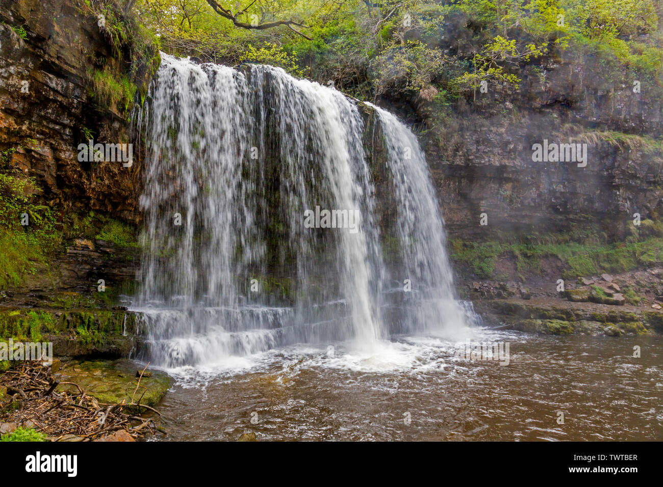 The Afon Hepste cascades over Sgwd yr Eira waterfall on the Four ...