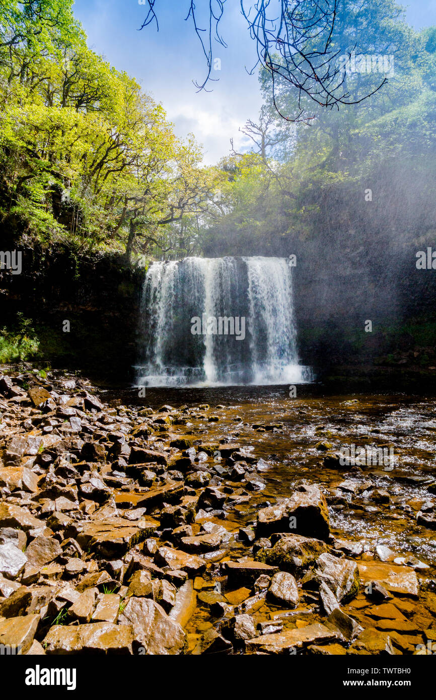 The Afon Hepste cascades over Sgwd yr Eira waterfall on the Four ...