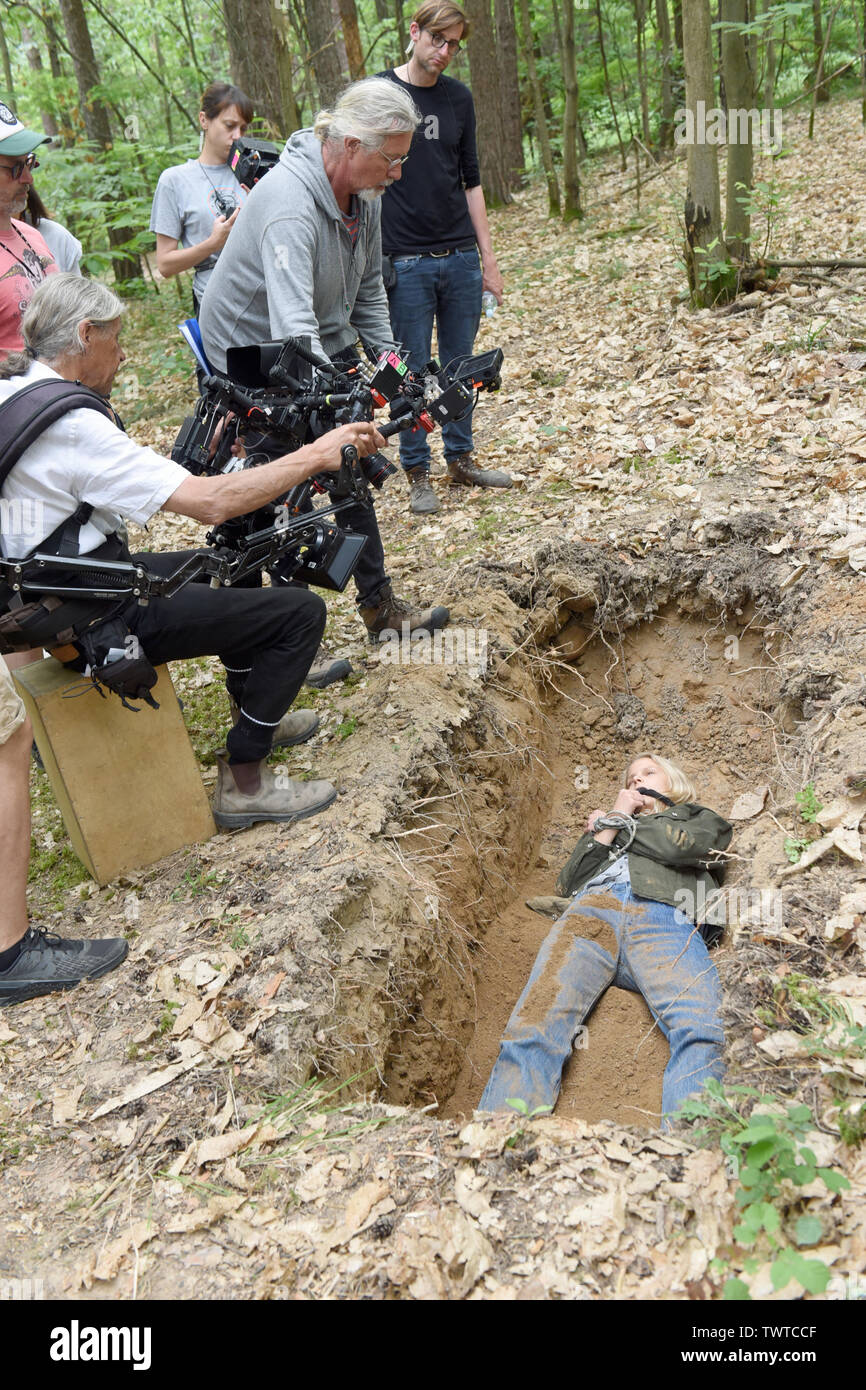 Eppan, Italy. 21st June, 2019. The actress Sinja Dieks lies in a scene ...