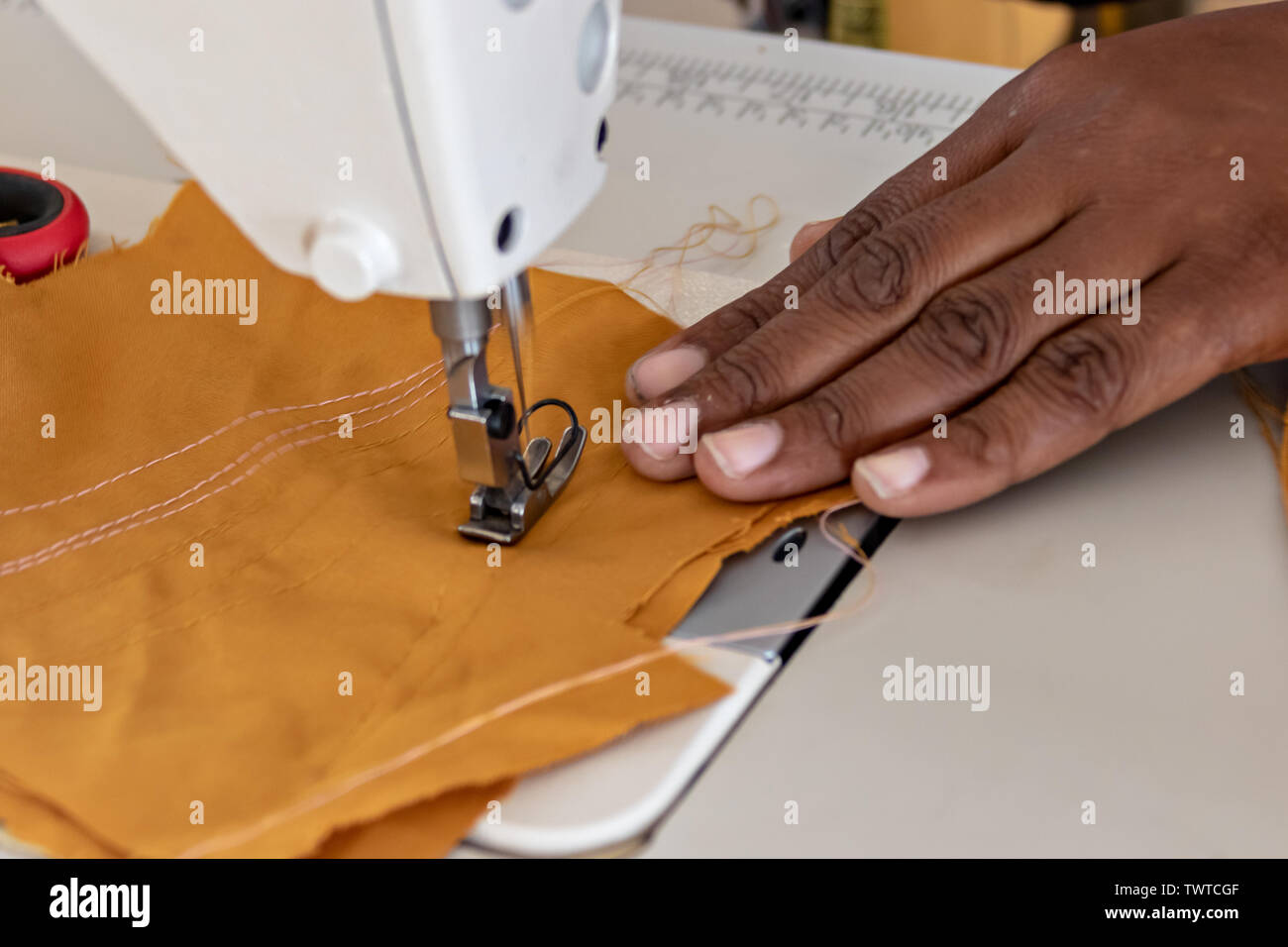 african worker on a sewing machine Stock Photo - Alamy