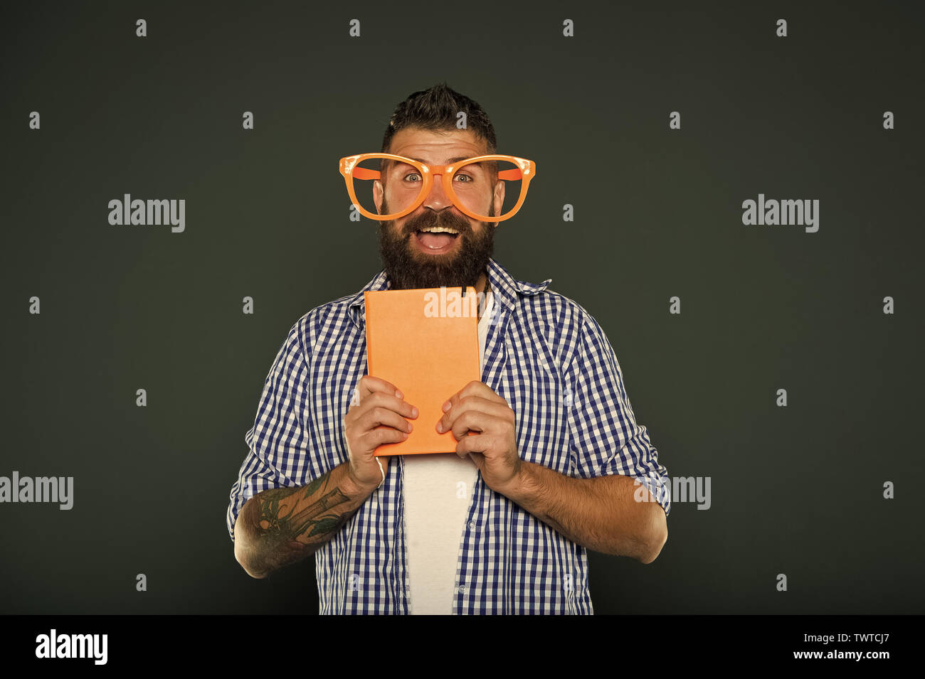 Nerdy and funny. University male student with lecture notes. Study nerd ...