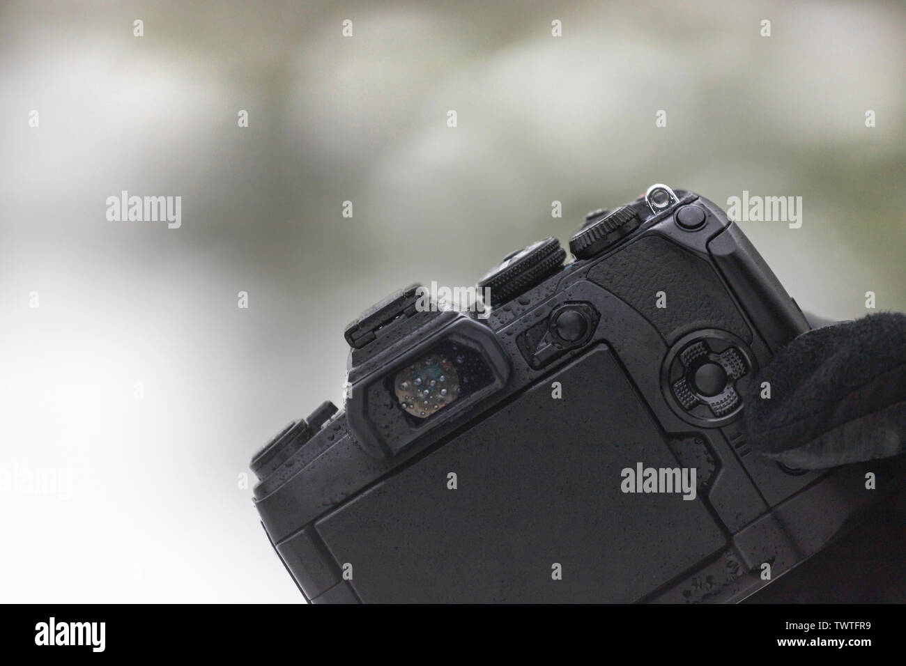 modern photo camera winter background Stock Photo - Alamy