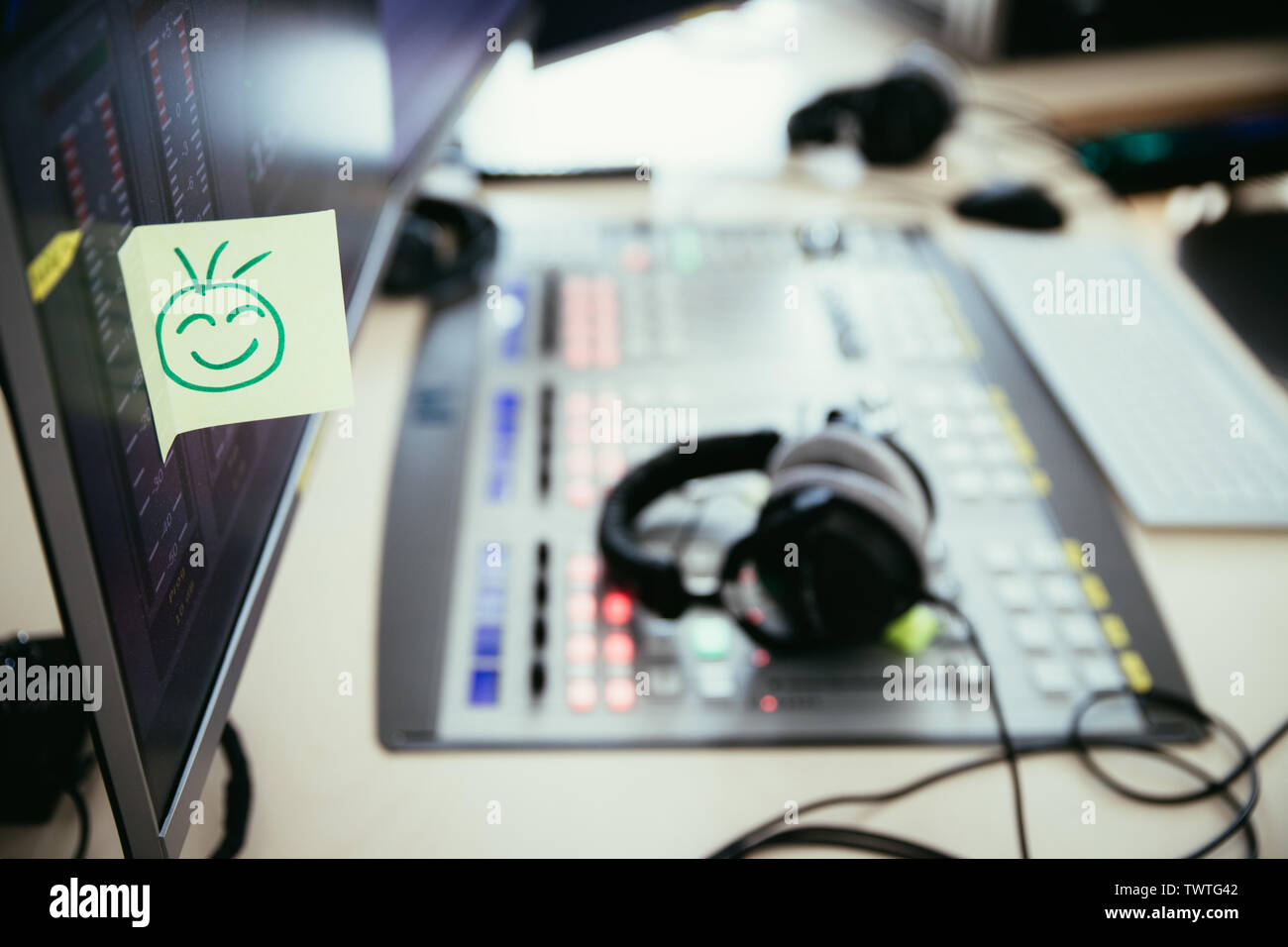 Smiley illustration at a radio studio, metaphor for feedback and ...