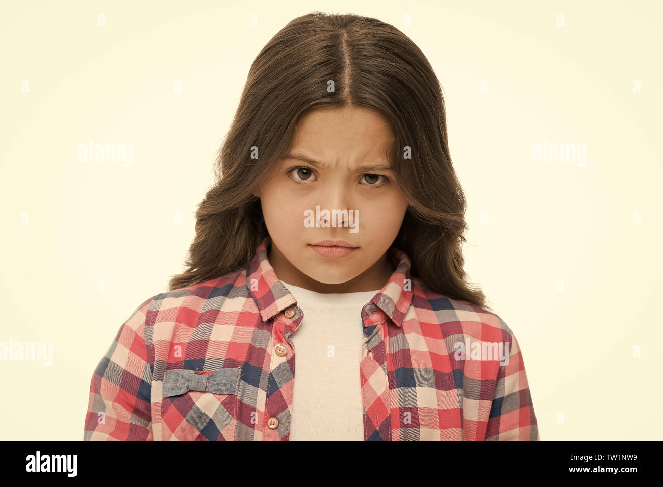 Little girl raise eyebrow isolated on white. Confident child with long ...