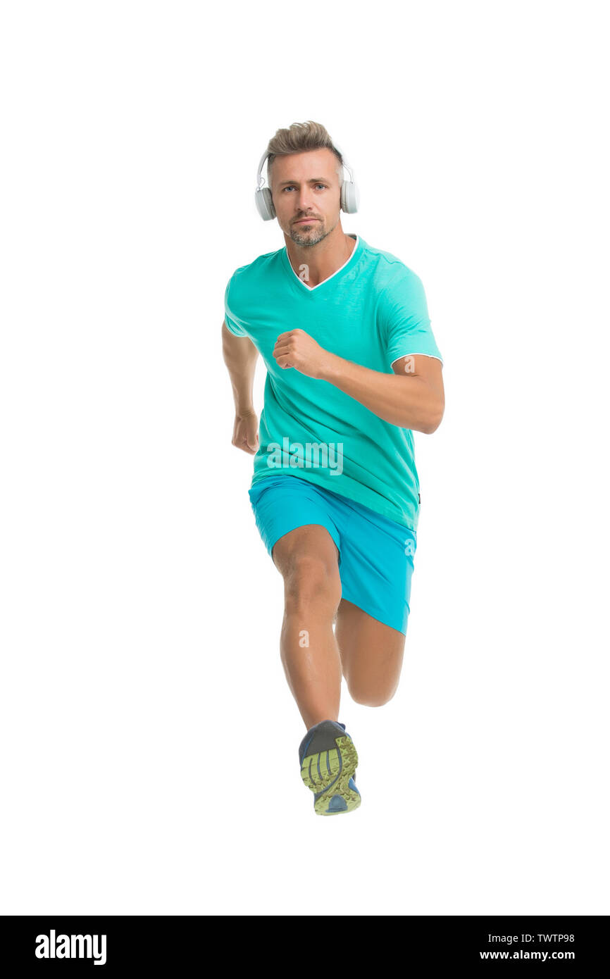 Motivational song. Man sportsman running with headphones. Runner ...