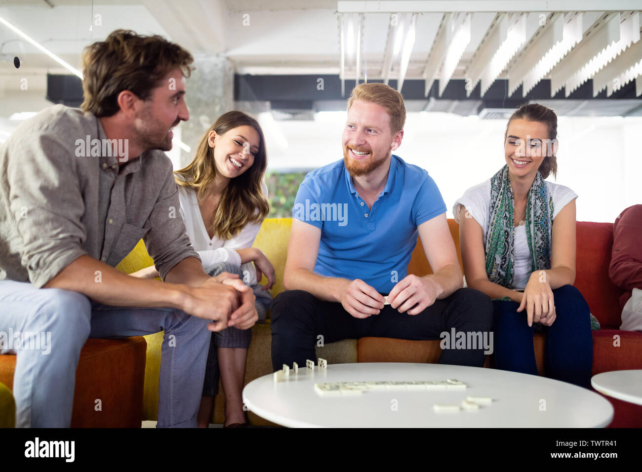 Carefree diverse office workers having fun during work break Stock ...