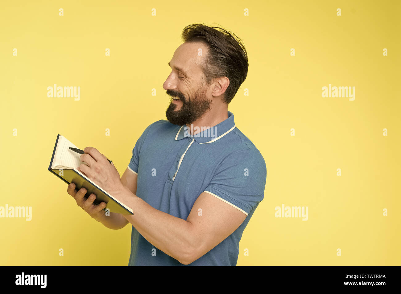 Time management skills. Man planning schedule hold notepad. Man bearded ...