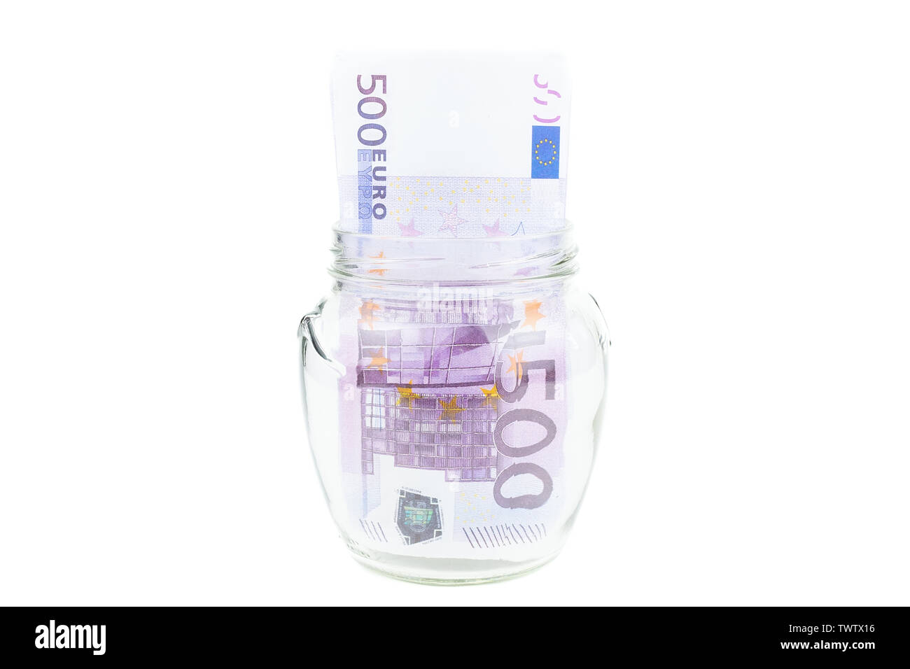 Euros saved in a glass jar on a white background Concept to save money ...