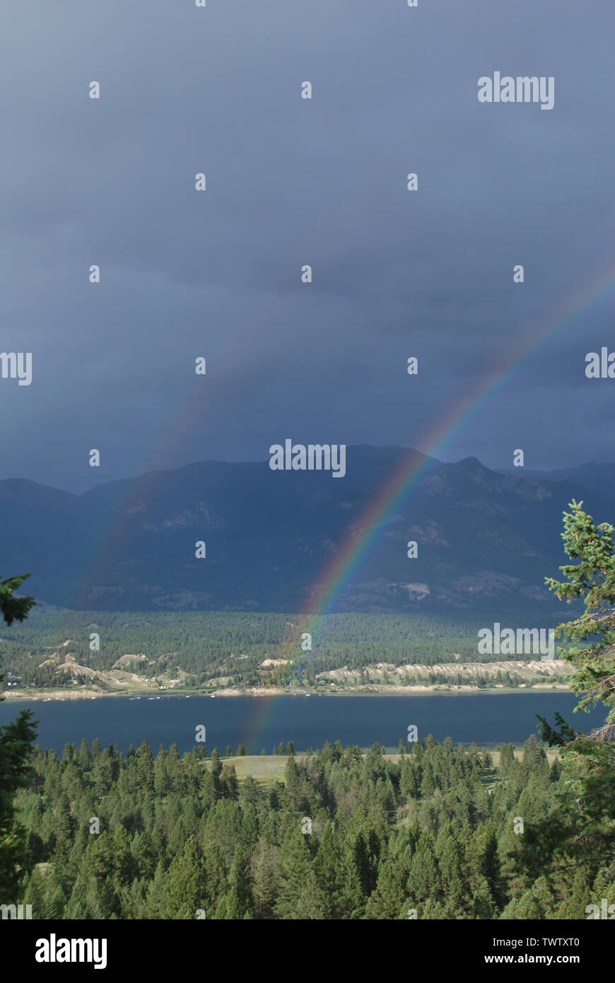 Rainbow double over mountains hi-res stock photography and images - Alamy