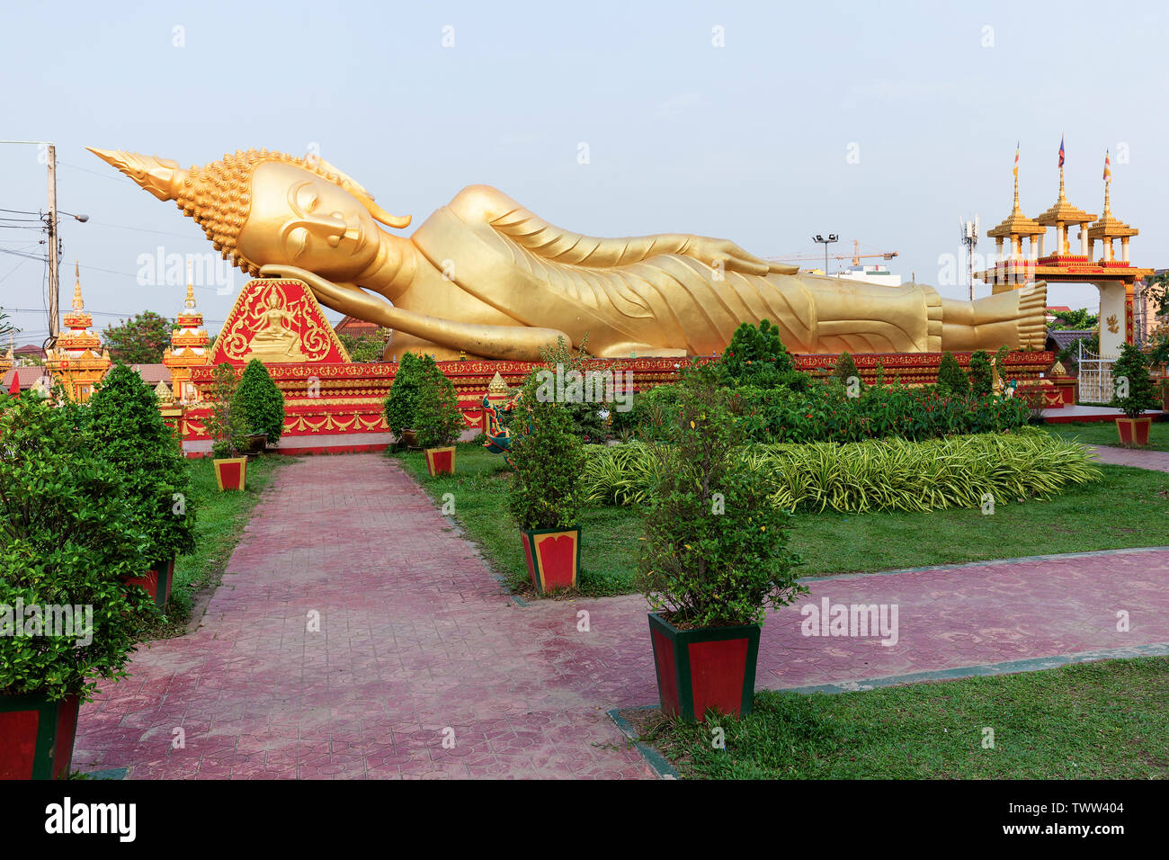 Laos temple statue gold buddha hi-res stock photography and images - Alamy