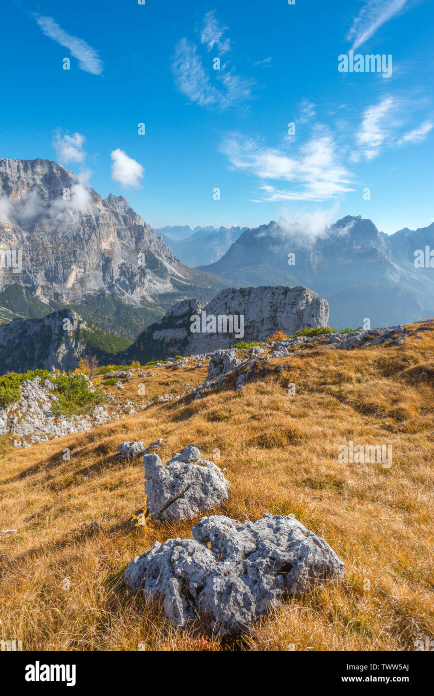 Glorious October day with sun and blue sky, mountain valley with autumn ...