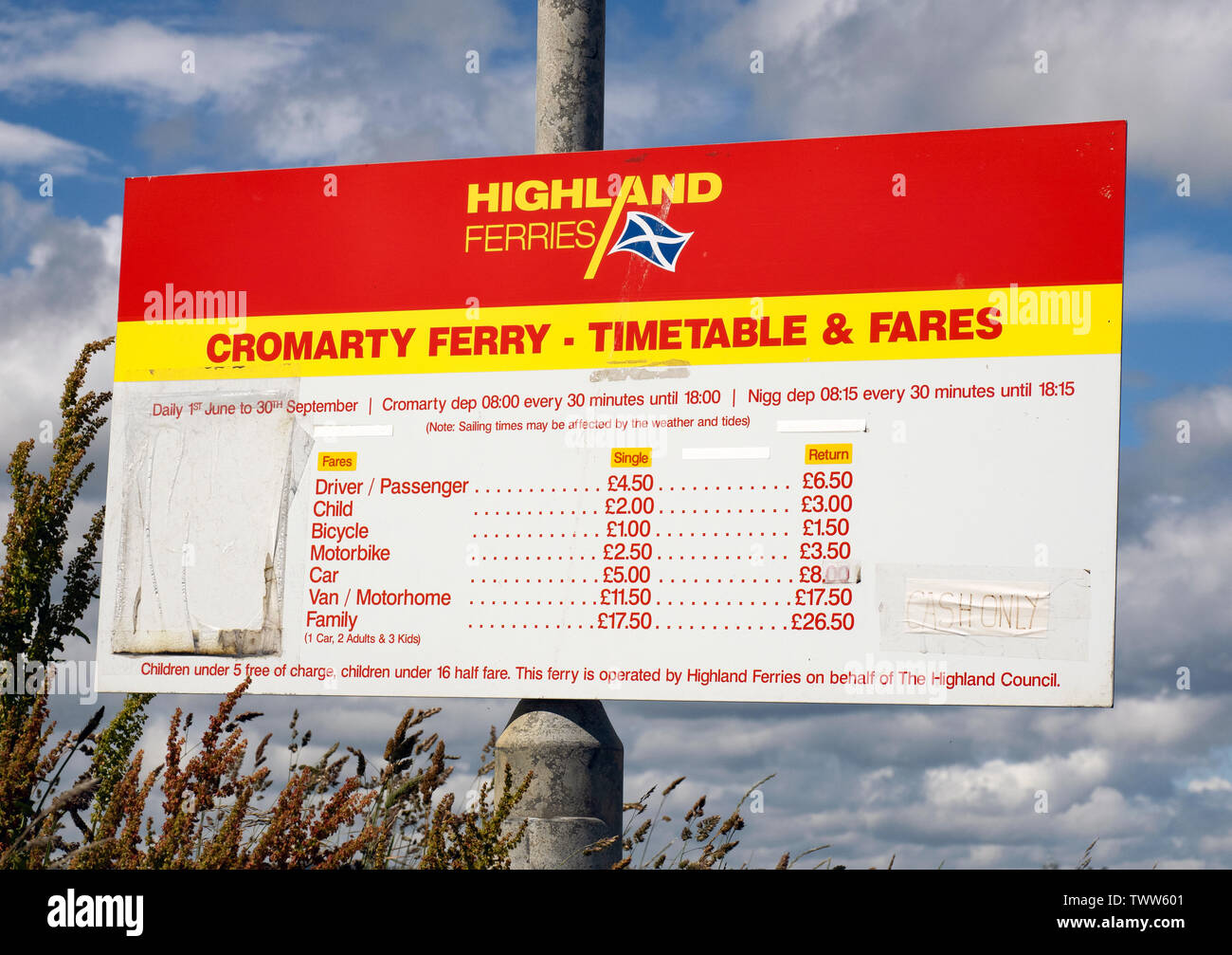 A road sign for the Cromarty to Nigg ferry, showing the timetable of ...
