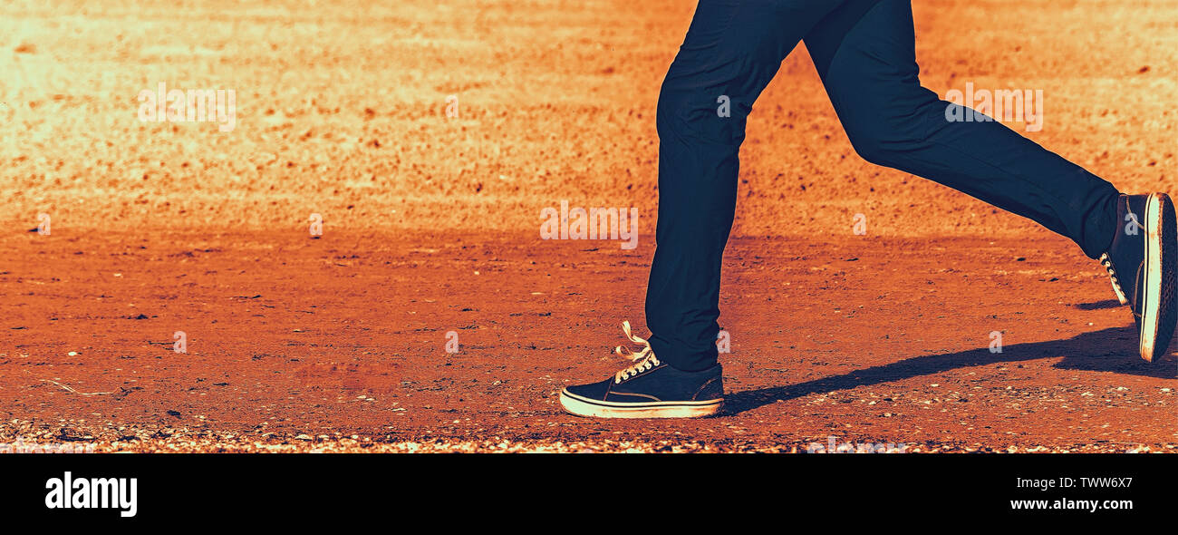 running on the red road Stock Photo - Alamy