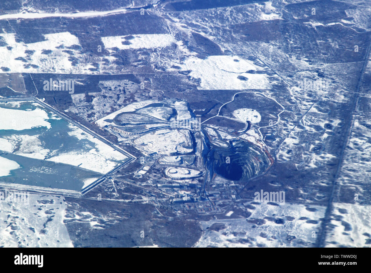 A very deep crater in the earth's crust. Open pit mining, opencast ...
