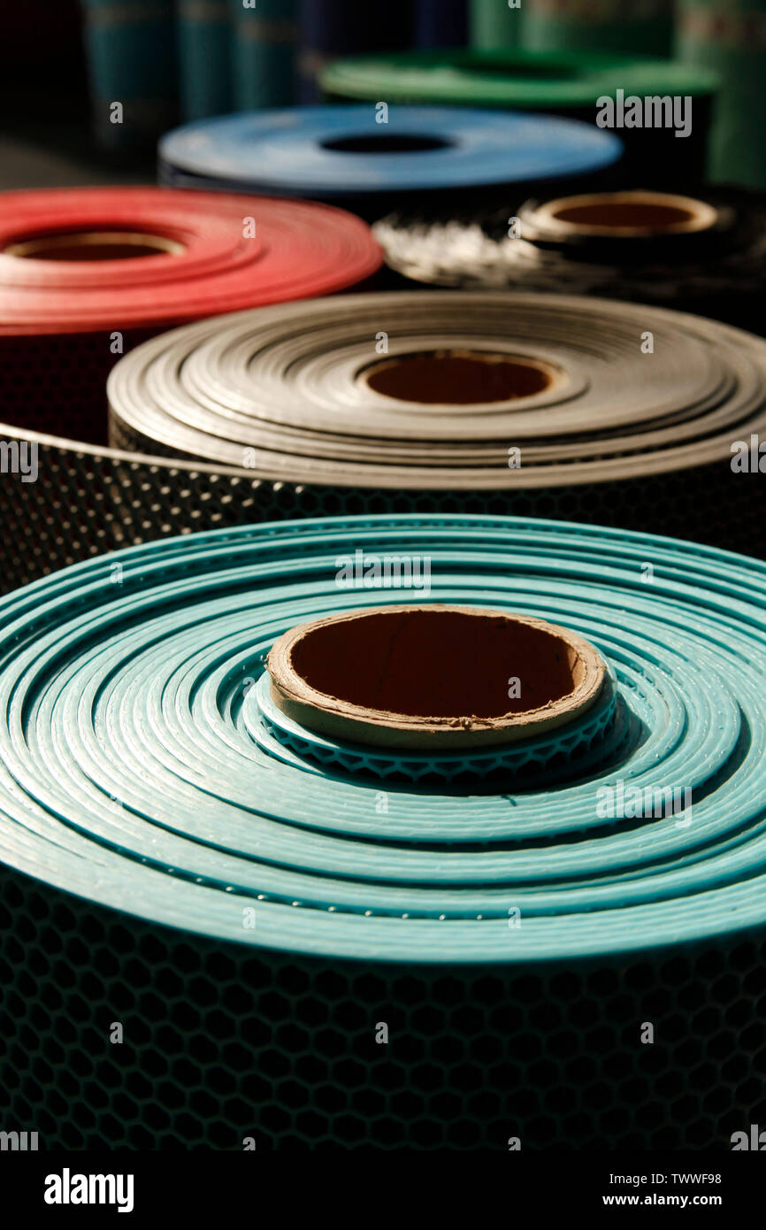 Colorful and perforated plastic grid Stock Photo - Alamy