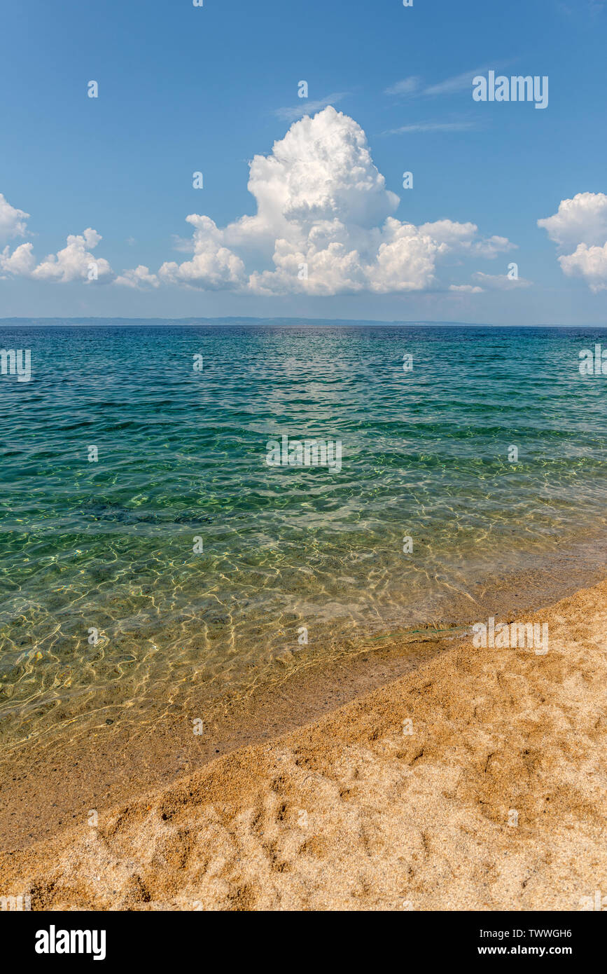 Sea sand sky concept. Sand on beach and blue summer sky, calmness and ...