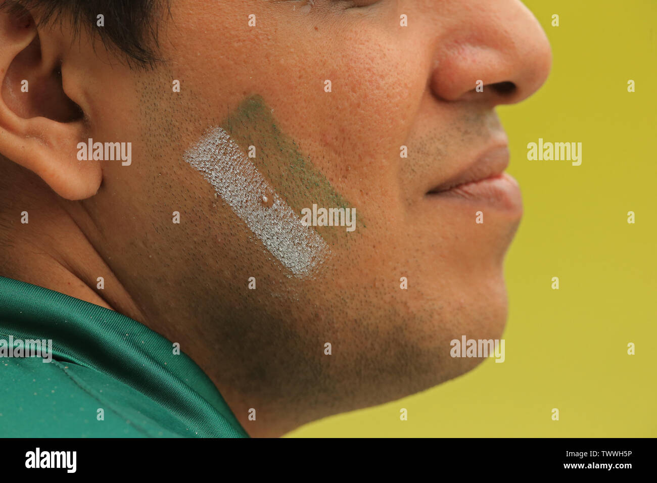 London, UK. 23 June 2019. A Pakistan fan with face paint during the ...