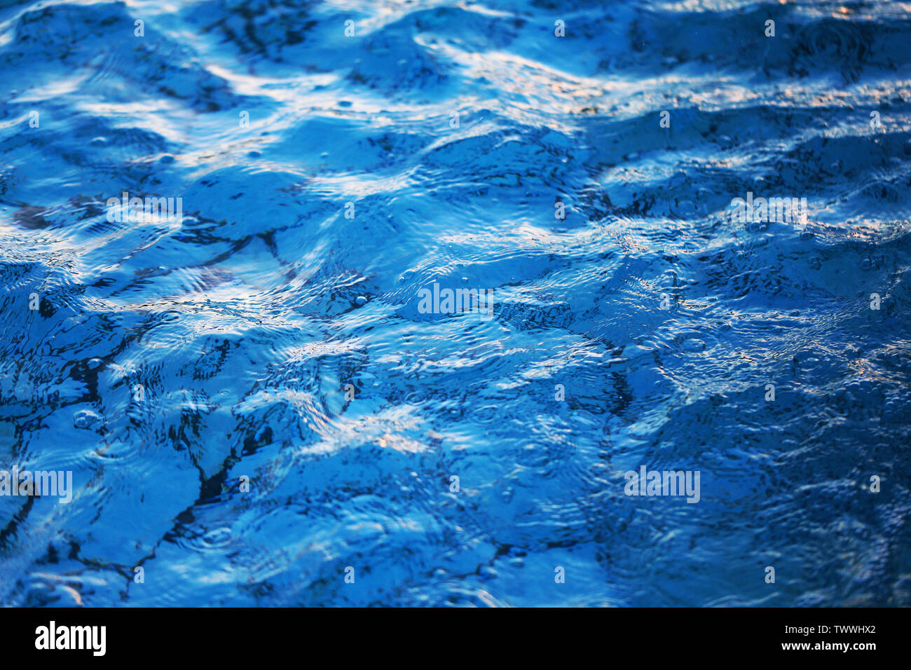Macro photo background with transparent blue waves of sea water ...