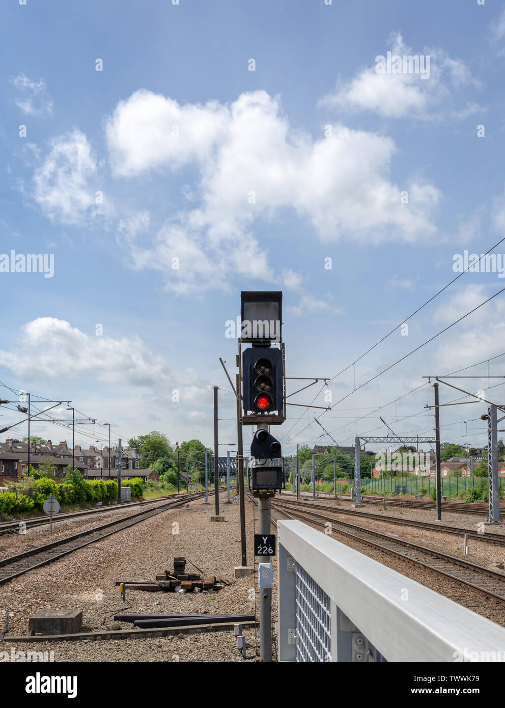 Signal light for trains at the end of a platform set to red. The train ...