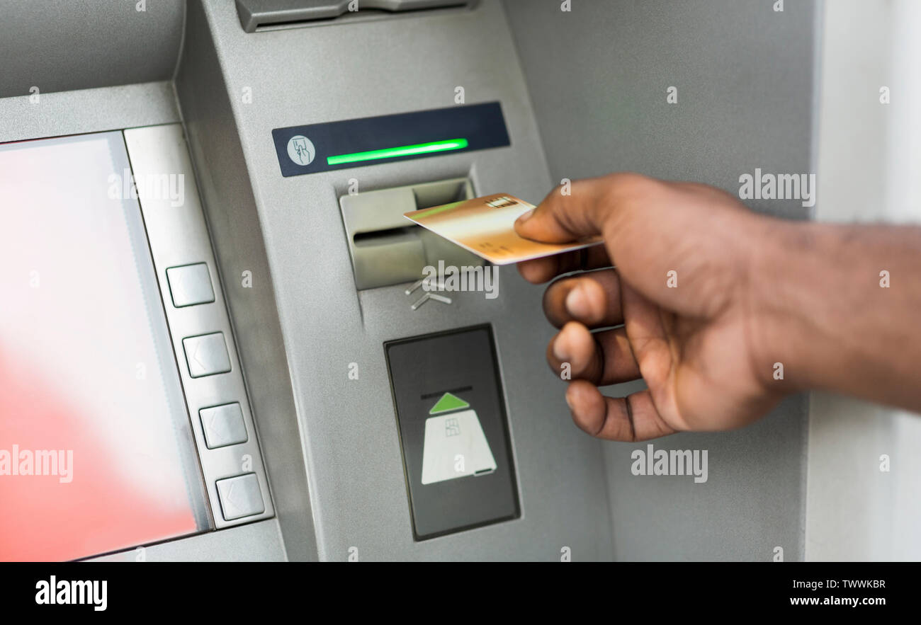 Person using atm hi-res stock photography and images - Alamy