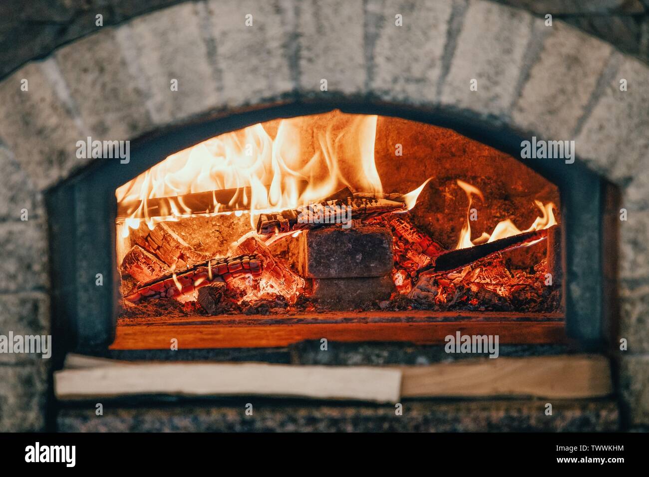 Traditional typical Italian oven for pizza and bread. Oven with bright ...